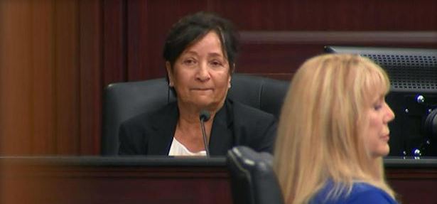 Medical Examiner Cries As Graphic Autopsy Photos Of 8 Yr Old Girl Shown