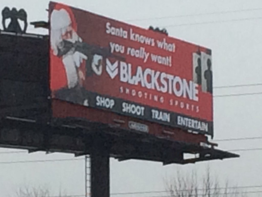 Charlotte Santa Gun Store Billboard Ad: Is It Offensive? | wfmynews2.com