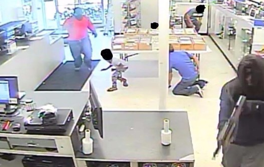 Surveillance photos show child in NC store during armed robbery ...